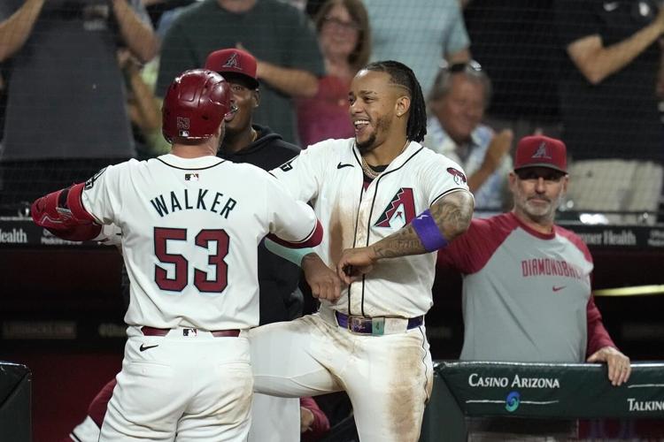 Walker hits 2 HRs, Pederson adds a grand slam and the D-backs coast ...