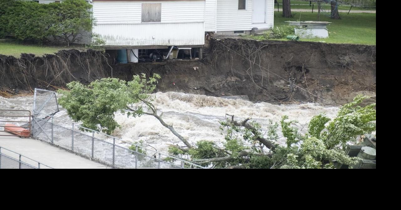 Minnesota family store is demolished from its perch near dam damaged by ...