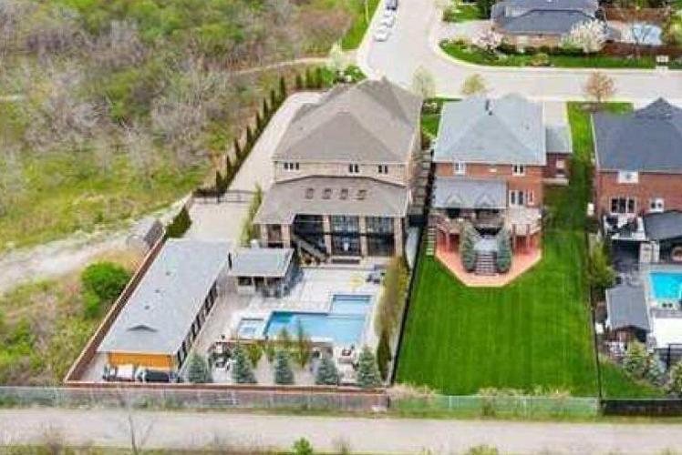 Illegal “fancy garage” remains on City of Hamilton parkland