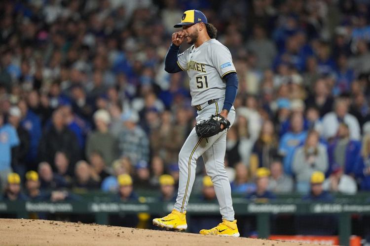 Boyd and Happ lead the Cubs past the Brewers 6-0 to send the NLDS to a deciding Game 5