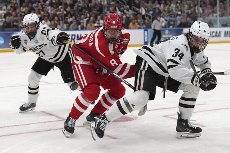 Western Michigan wins its 1st Frozen Four hockey title, beating Boston University 6-2