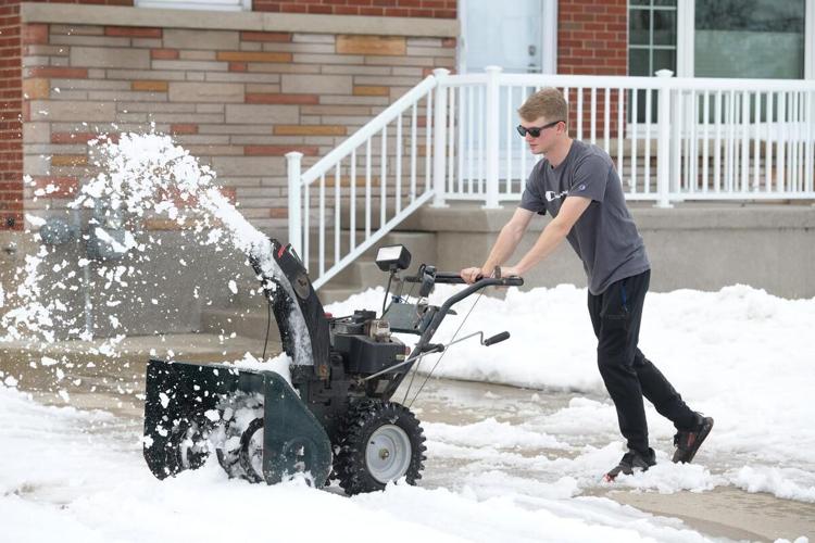 Snowstorm brings dense wet mess along with ‘thundersnow’ spectacle