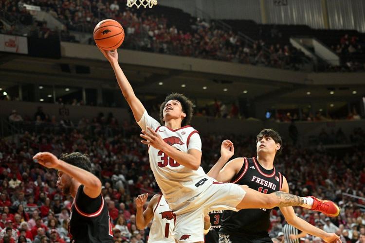 Acuff scores 18 points to lead No. 25 Arkansas over Fresno State 82-58