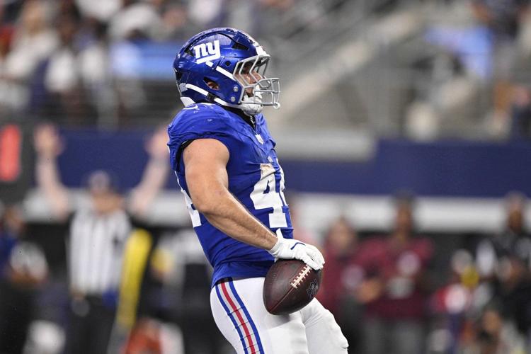 Giant firsts for rookies as RB Cam Skattebo scores TD and QB Jaxson Dart takes snap for NY