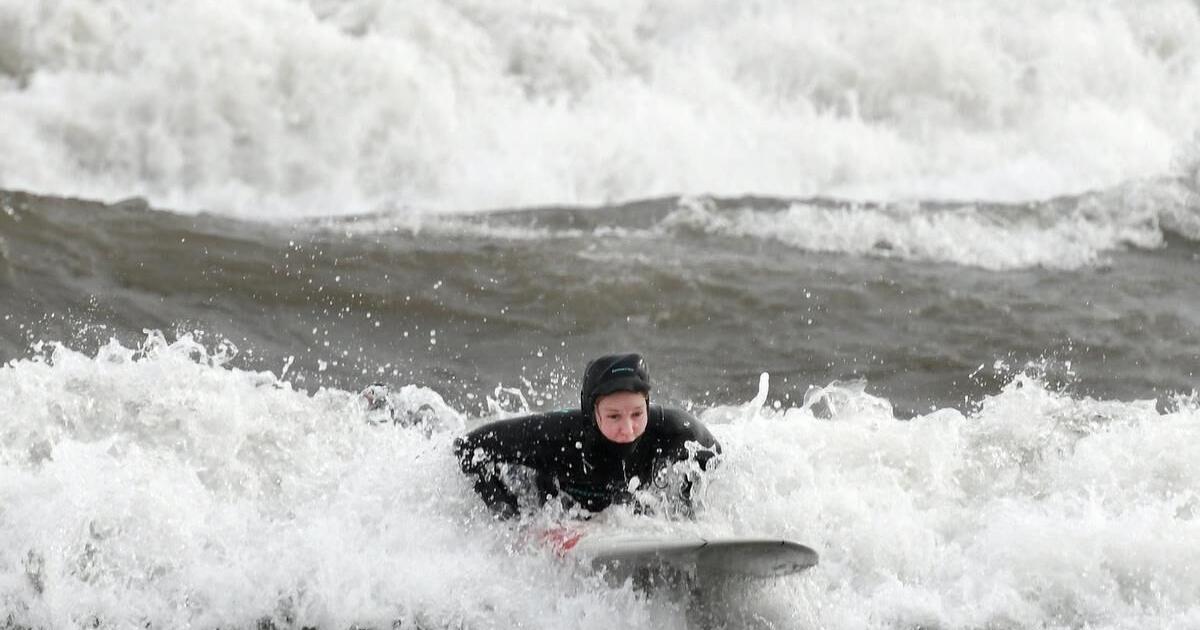Surfing the pounding Lake Ontario waves