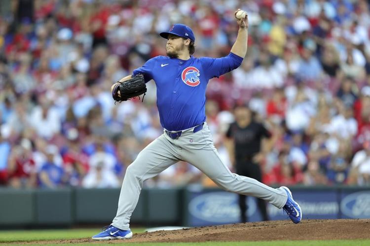 Surging Reds beat Cubs 3-2 for 6th straight victory