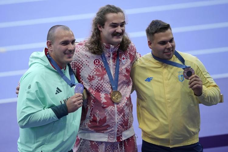 Ukraine's medalists at the Paris Olympics face a long trek home. For ...