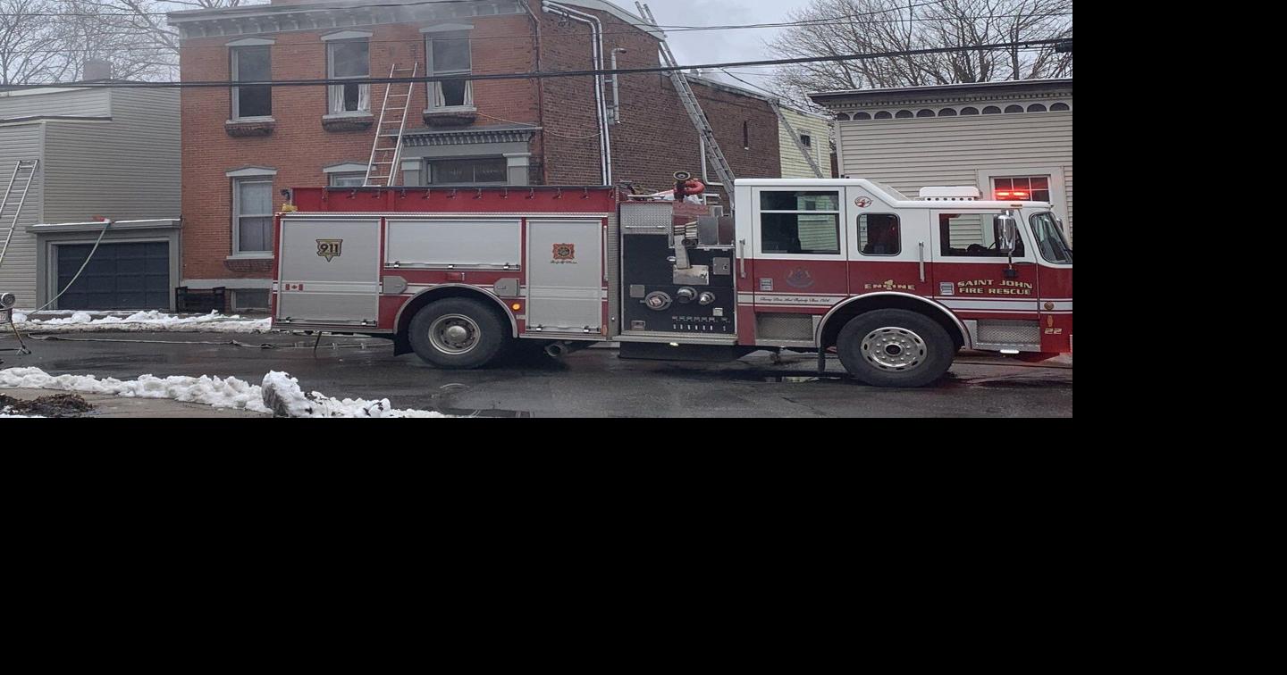 Firefighters battle blaze in uptown apartment building