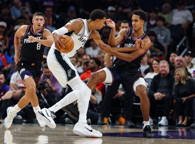 Booker scores 28 and Wembanyama has off night as Suns hand Spurs their first loss, 130-118