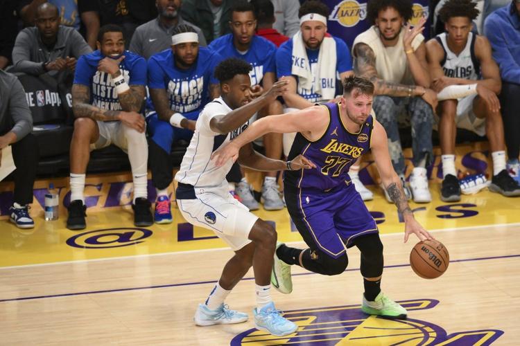 Luka Doncic posts a triple-double against the Dallas Mavericks, leads the Lakers to a 107-99 win