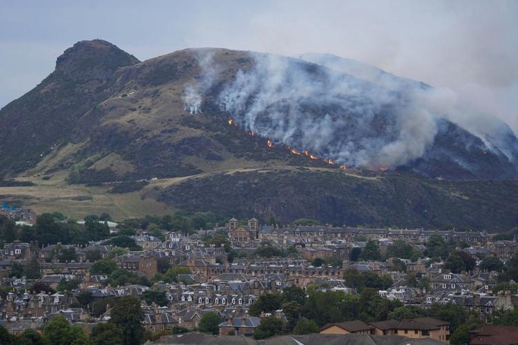 Firefighters in Scotland battle large brush fire on hill near Edinburgh