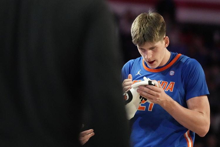 Florida's Alex Condon will wear a mouthpiece moving forward following ...