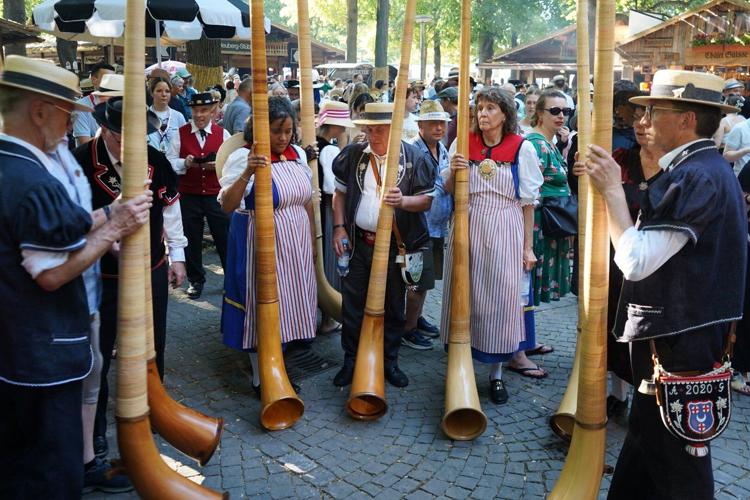 Heat forces yodelers at annual Swiss festival to sing in fountains