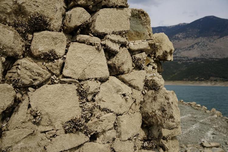 Ruins of a long-sunken Greek village emerge as drought saps a vital ...