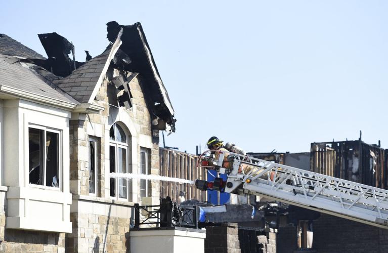 Suspicious: Massive fire damages multiple homes in Burlington