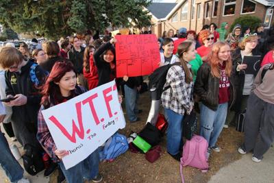 Students walk out