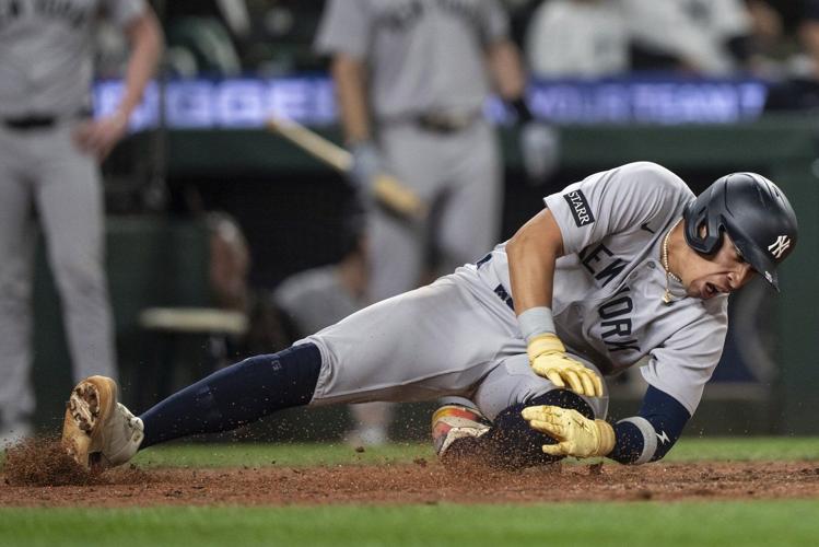 Yankees 3B Oswaldo Cabrera leaves game vs. Mariners in ambulance following awkward home plate slide