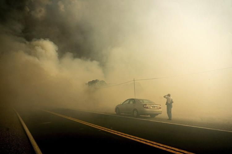 A wildfire sweeps through a historic California gold-mining town in photos