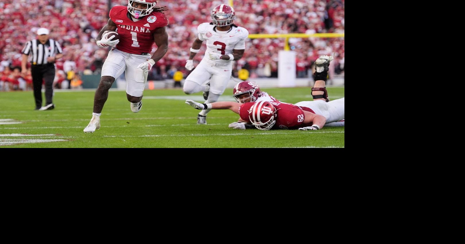 Strong ground games propel No. 1 Indiana and No. 5 Oregon to CFP ...