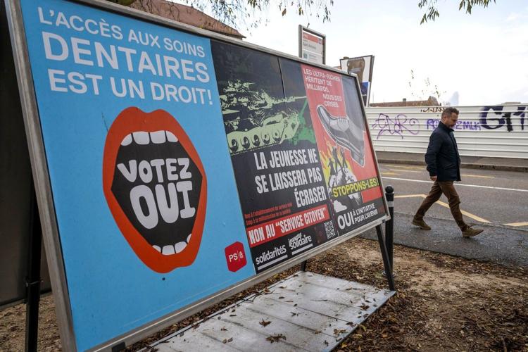 Swiss voters consider whether women, like all male citizens, must do ...