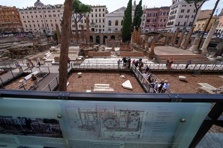 Ancient Roman temple complex, with ruins of building where Caesar was ...