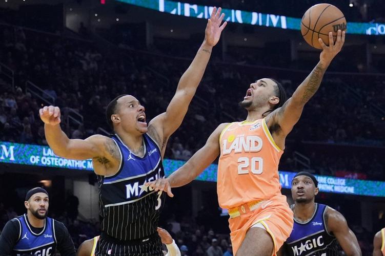 Mitchell scores 45 as Cavaliers beat Magic 114-98 for 4th straight win