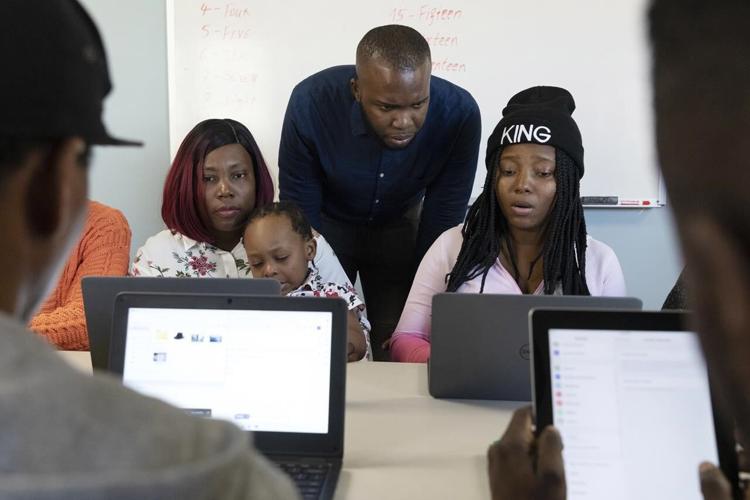 At a church rectory in Boston, Haitian migrants place their hopes on ...