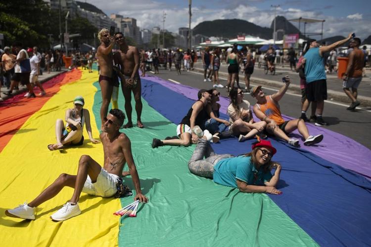 Rainbow-clad revelers hit Copacabana beach for Rio de Janeiro’s pride ...