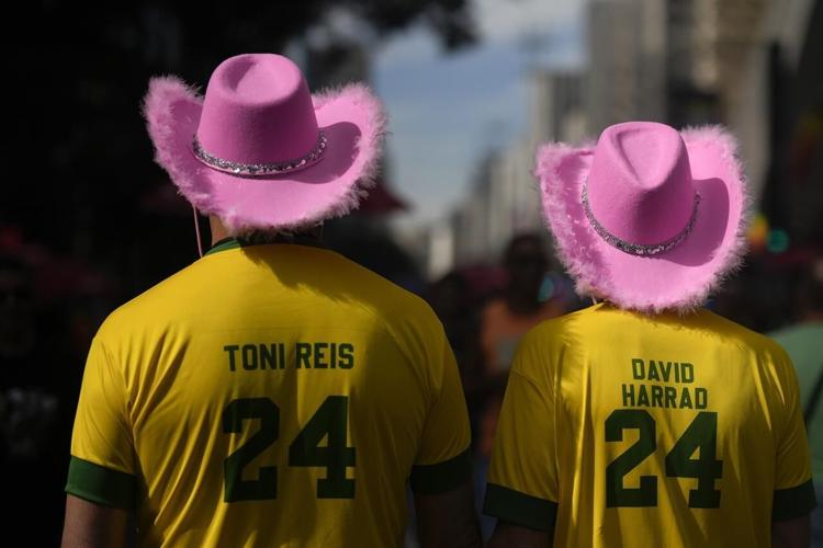 Gay pride revelers in Sao Paulo reclaim Brazil's national symbols