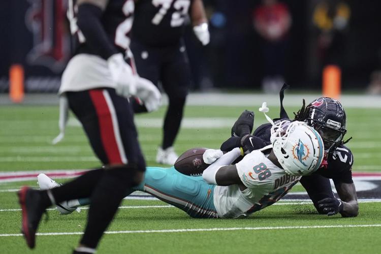 Dolphins place receiver Grant DuBose on injured reserve after hit to ...
