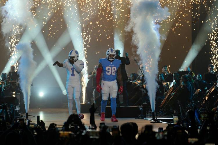 Titans unveil new uniforms and logos to go with new coach and new ...