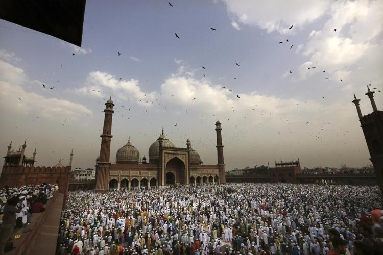 What is Eid al-Fitr and how do Muslims celebrate the Islamic holiday?
