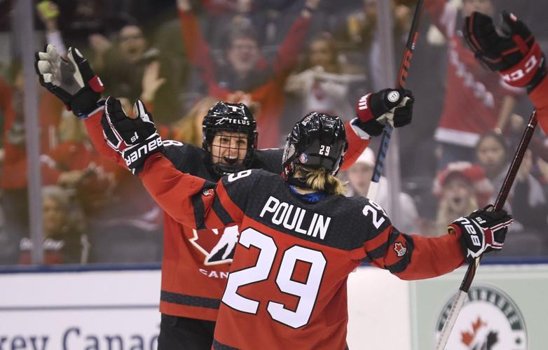 Canadian hockey star’s last Olympic leap — with a new flag