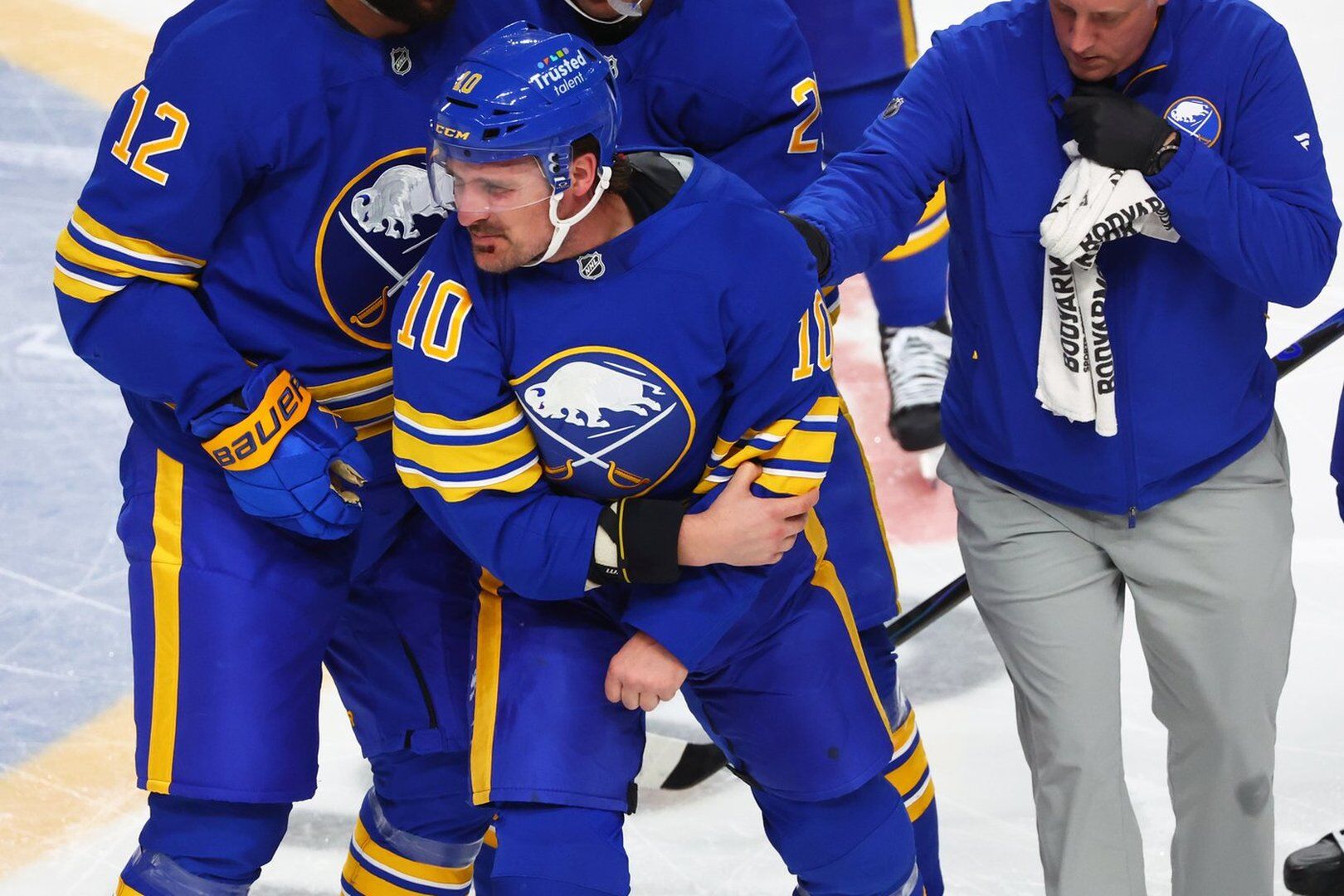 Sabres center Sam Carrick suffers left arm injury in fight with ...