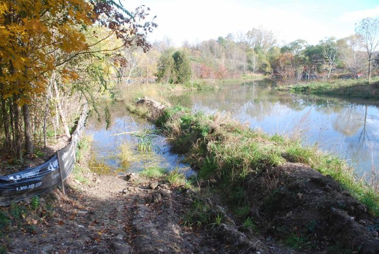 Abandoned fencing around Delsey Pond in Dundas creates potential hazards