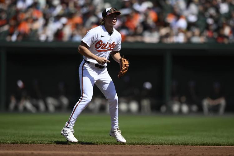Holliday's first hit helps the Orioles rally to a 6-4 win over the Brewers and avoid a sweep