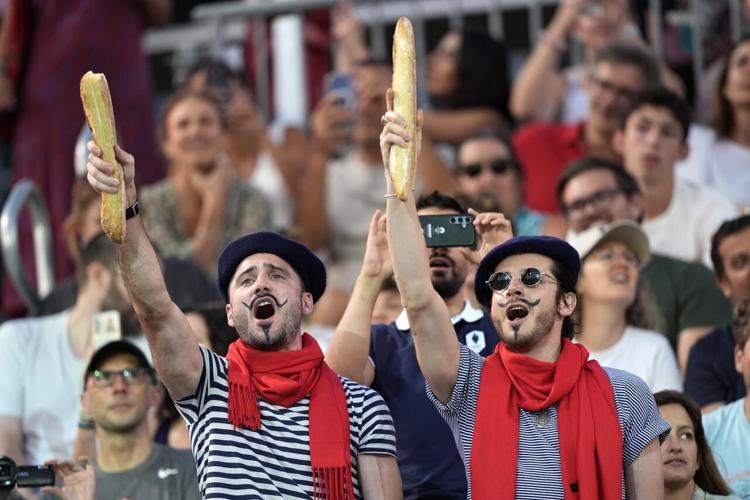 Parisians once scoffed at hosting the Olympics. Now, here come the conga lines