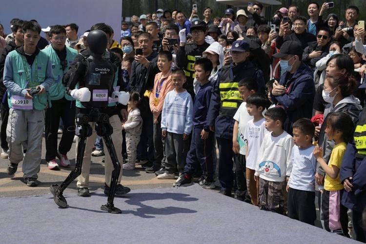 No sweat: Humanoid robots run a Chinese half-marathon alongside flesh ...