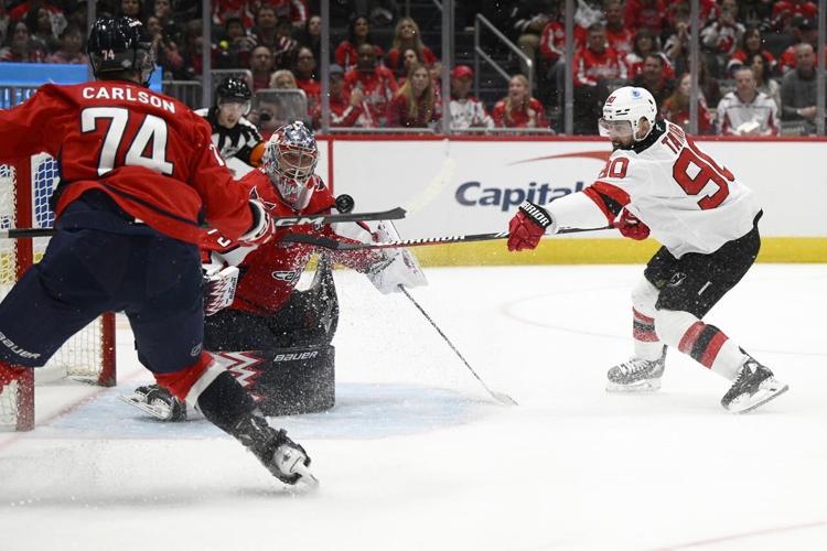 Cotter scores 2 goals to lift Devils over Capitals 5-3
