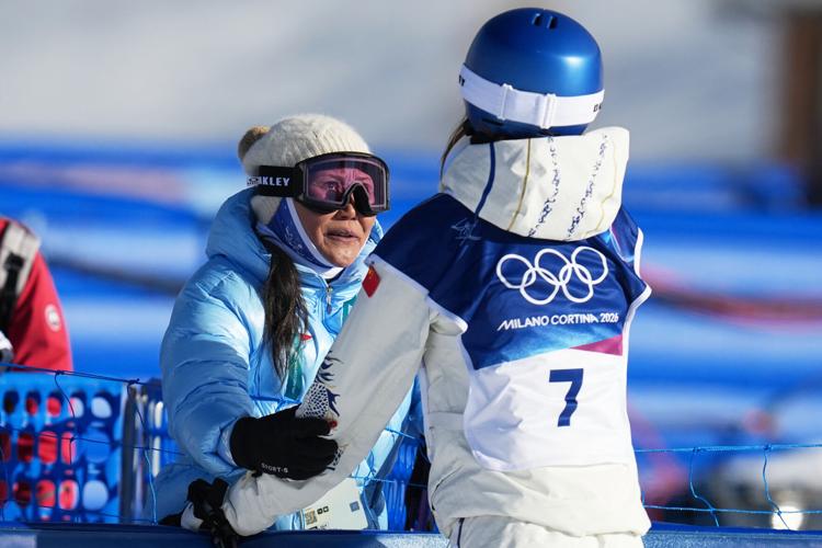 Eileen Gu overcomes an early fall in slopestyle to keep her Olympic ...