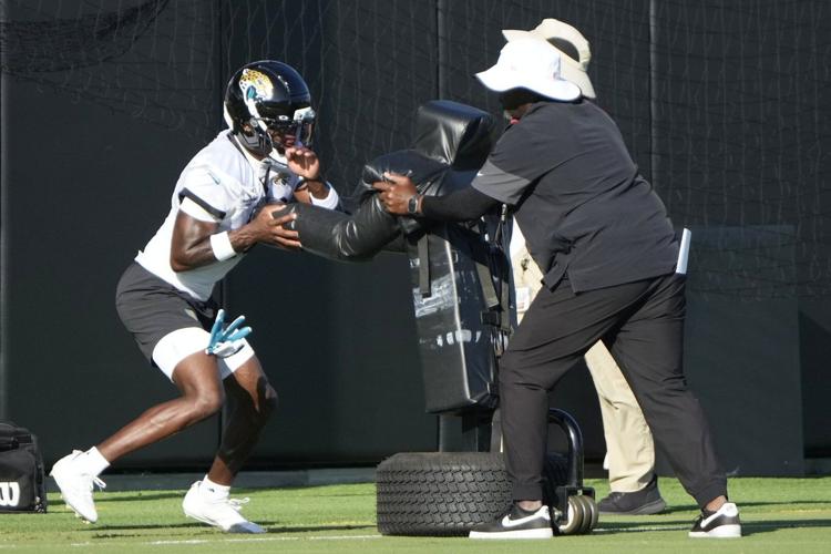 Playing both sides of the ball is now part of Travis Hunter's regular ...