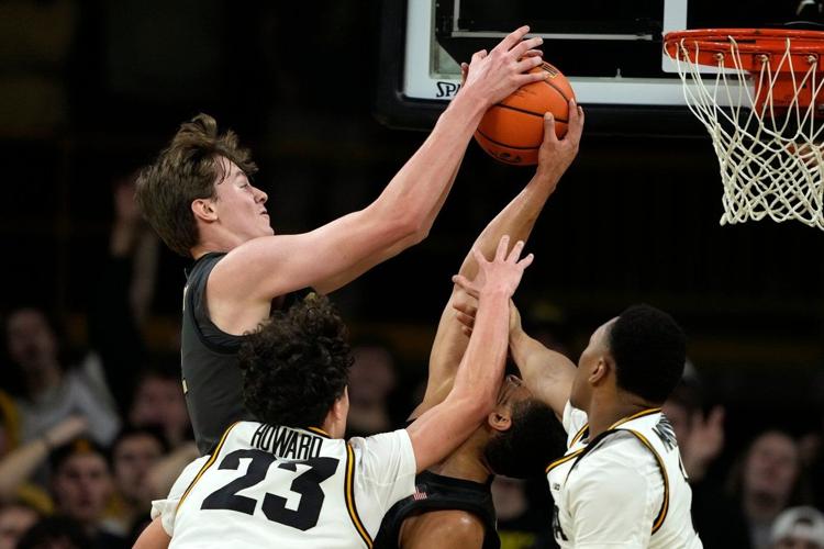C.J. Cox, Gicarri Harris lead No. 13 Purdue past Iowa, 78-57