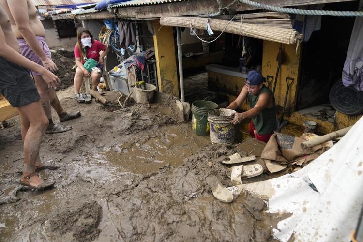 At least 126 dead and missing in massive flooding and landslides in Philippines
