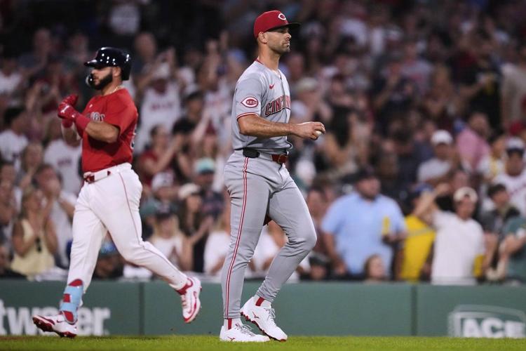 Encarnacion-Strand hits his 1st career grand slam to power Reds' rally ...