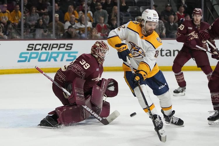 Logan Cooley has 1st NHL hat trick, Coyotes stop Predators' points ...