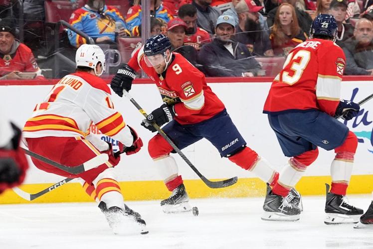 Kadri helps Flames beat Panthers 5-3, Cup champs lose fourth in six ...