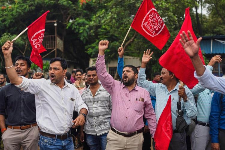 Indian workers go on a daylong nationwide strike against Modi's ...