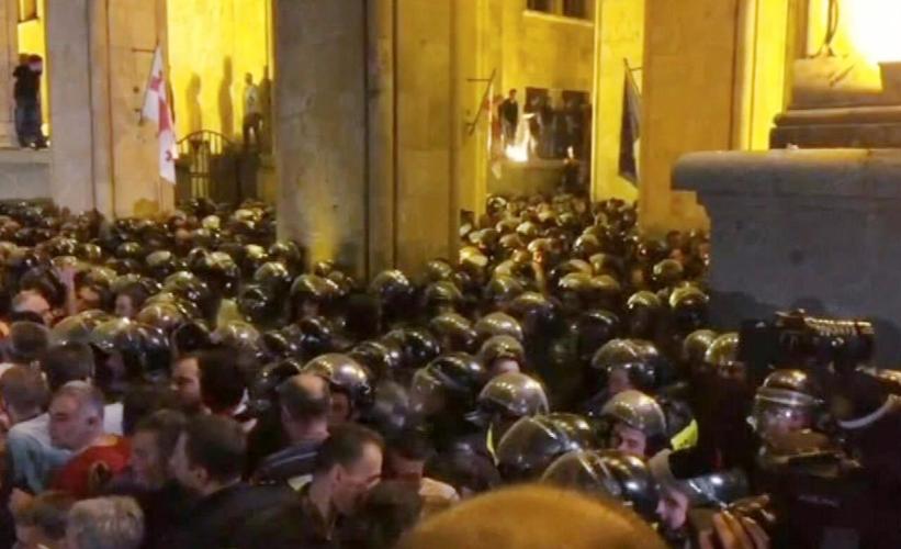 Riot police drive protesters away from Georgian parliament