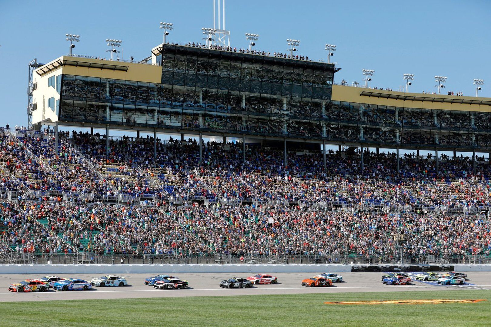 Elliott steals Kansas Speedway race in wild overtime finish, secures ...