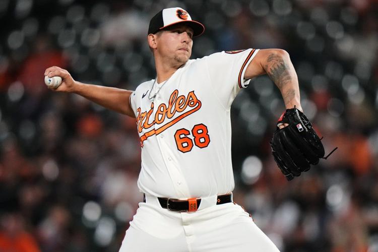 Leiter and Burger lead the Rangers to a 5-2 victory over the Orioles